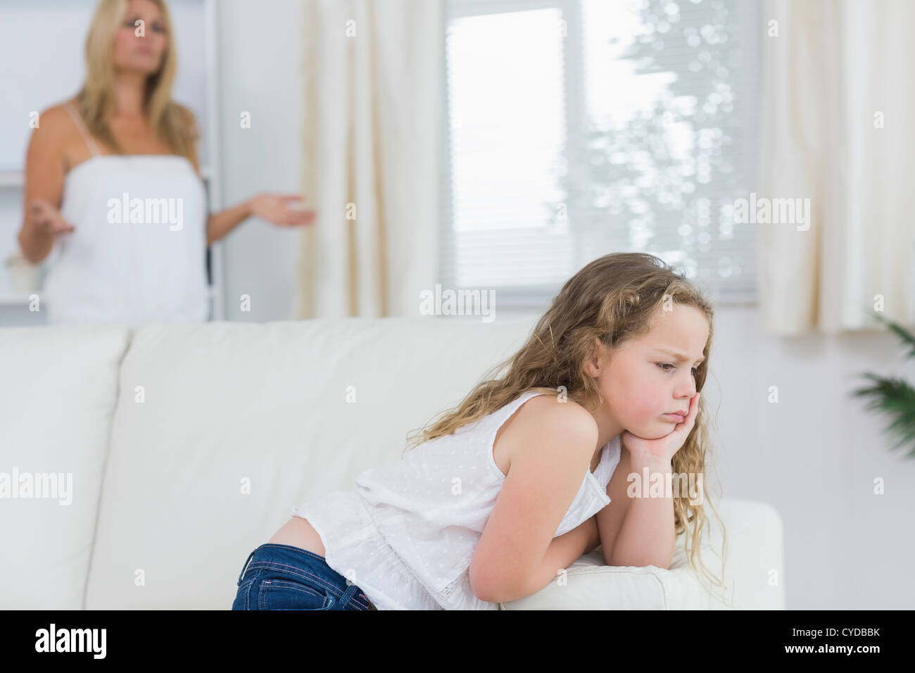 Upset mother talking to daughter Stock Photo - Alamy