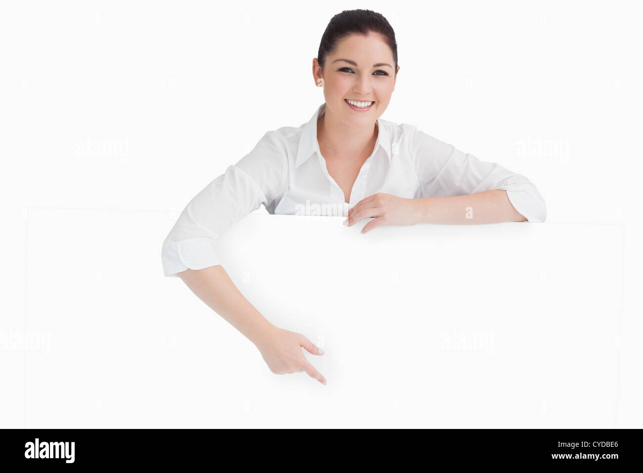 Woman pointing to white board Stock Photo - Alamy