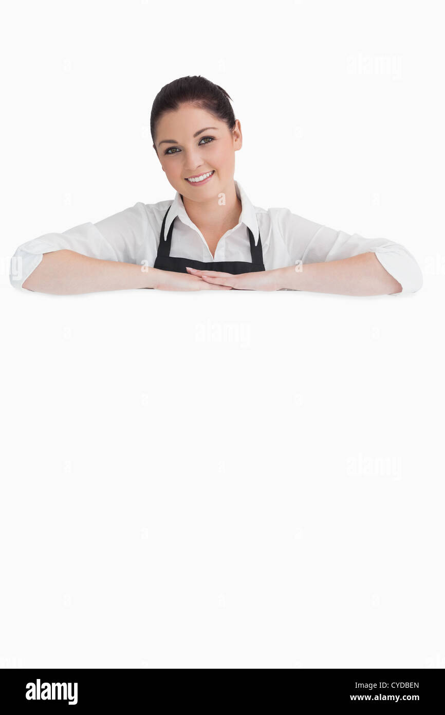 Cheerful woman resting on her arms Stock Photo - Alamy