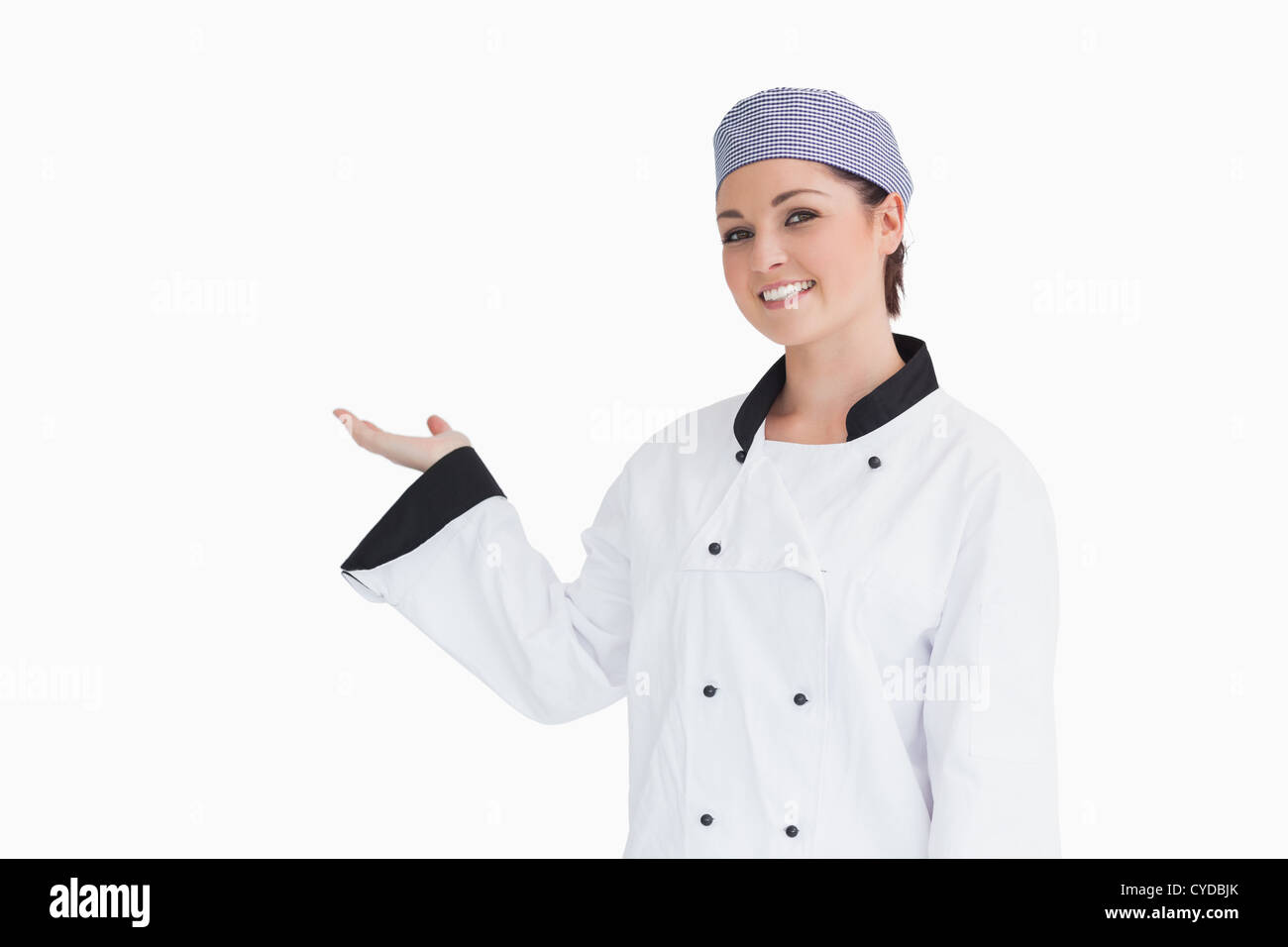 Happy chef showing something Stock Photo - Alamy