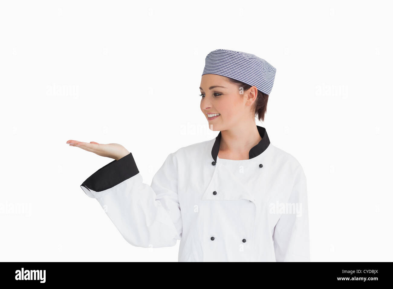 Chef presenting something Stock Photo - Alamy
