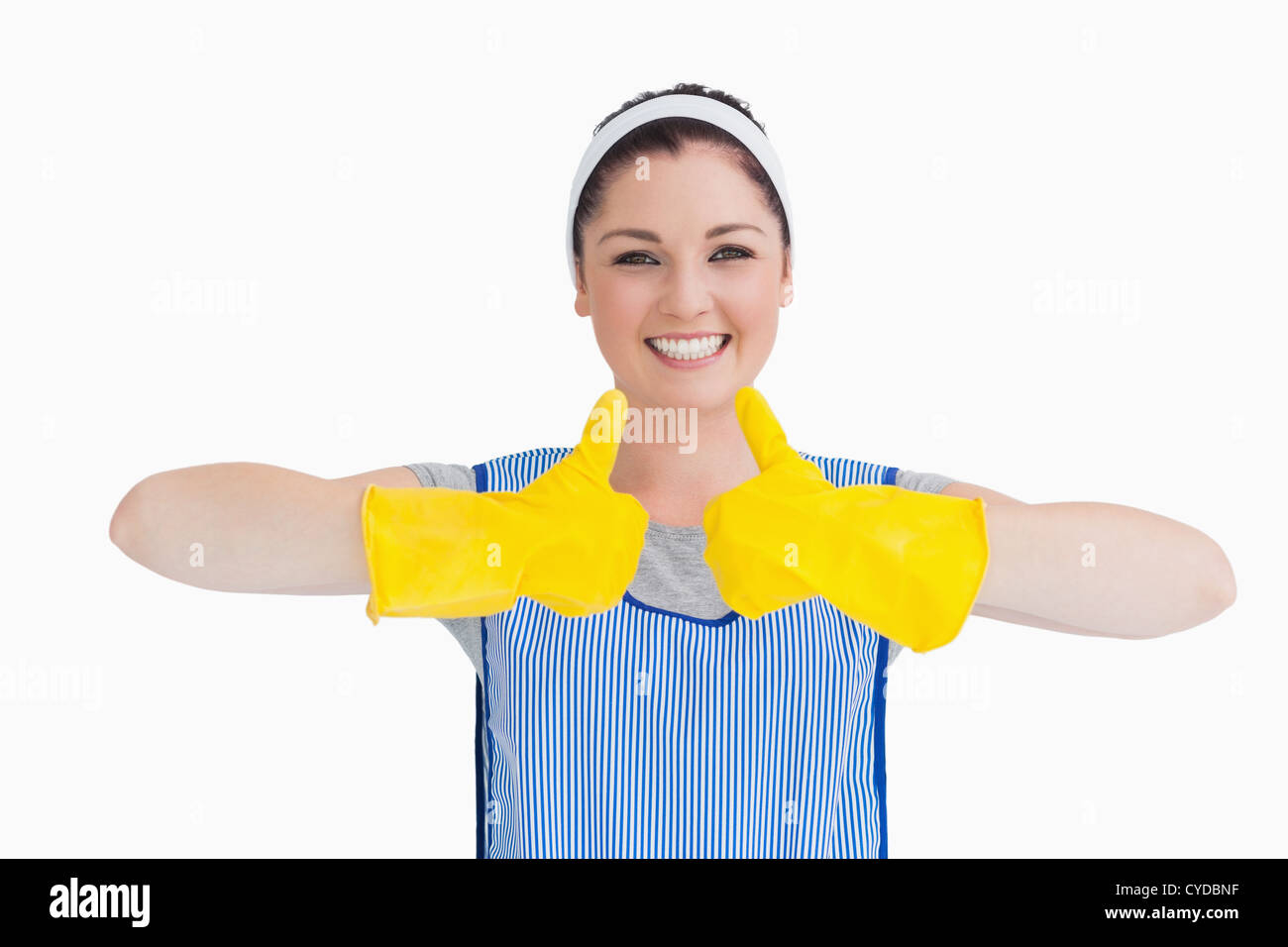 Cleaner woman thumbs up with yellow gloves Stock Photo - Alamy