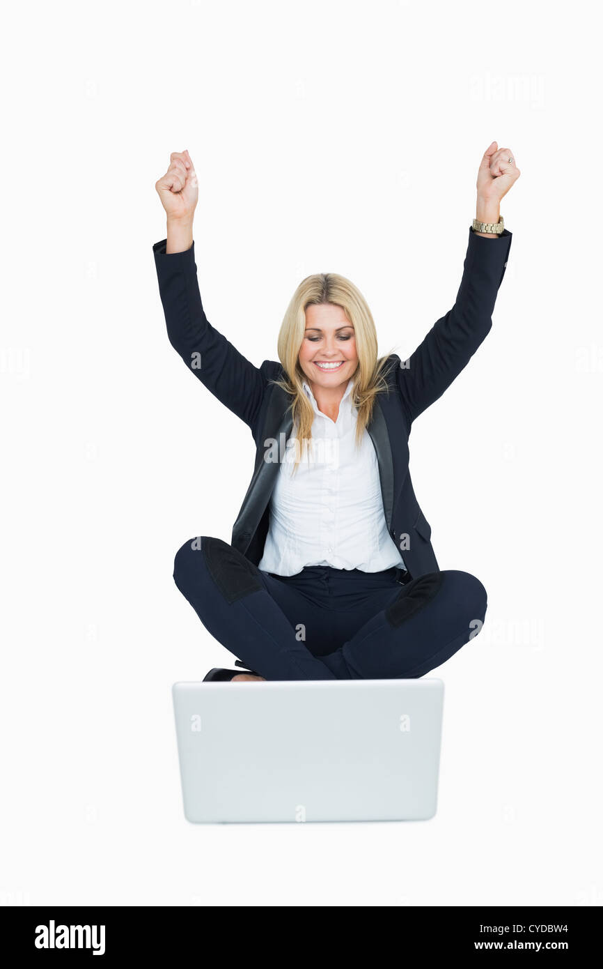 Business woman lifting her arms in celebration Stock Photo - Alamy
