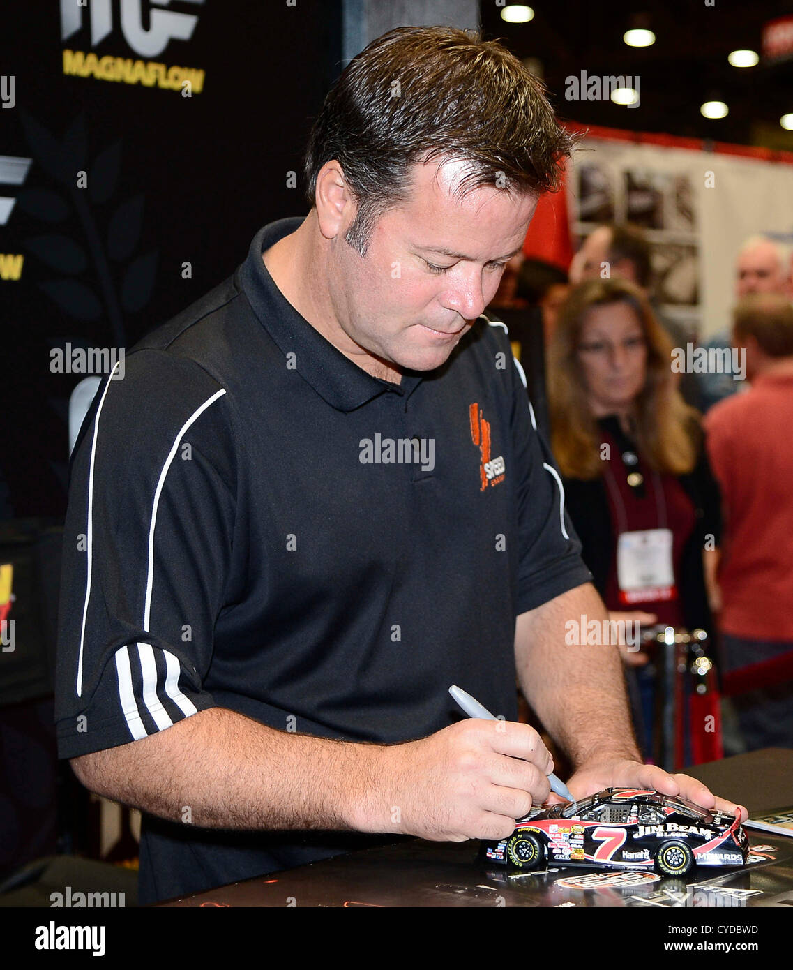 Nov 1,2012. Las Vegas NV. NASCAR and off road racer Robby Gordon signs ...
