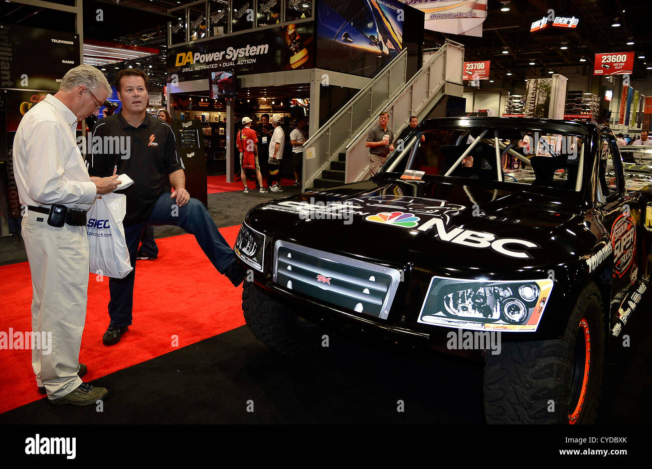 Nov 1,2012. Las Vegas NV. NASCAR and off road racer Robby Gordon signs ...