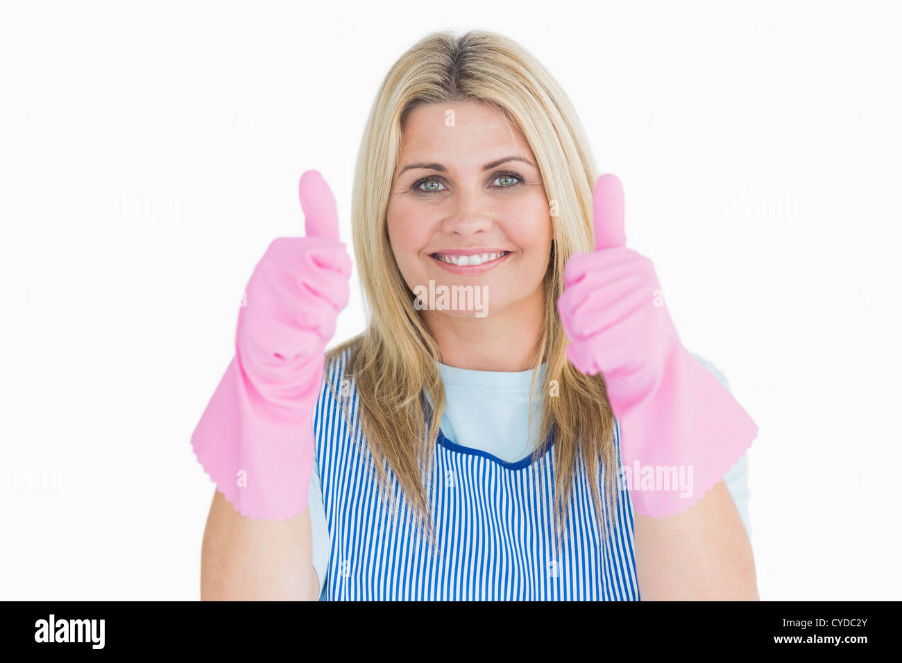 Cheerful cleaner putting thumbs up with pink gloves Stock Photo - Alamy