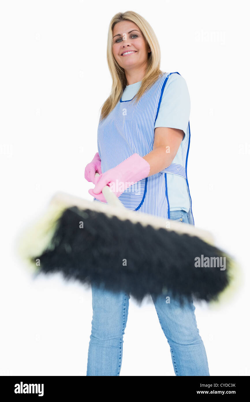 Cleaning woman sweeping up Stock Photo - Alamy