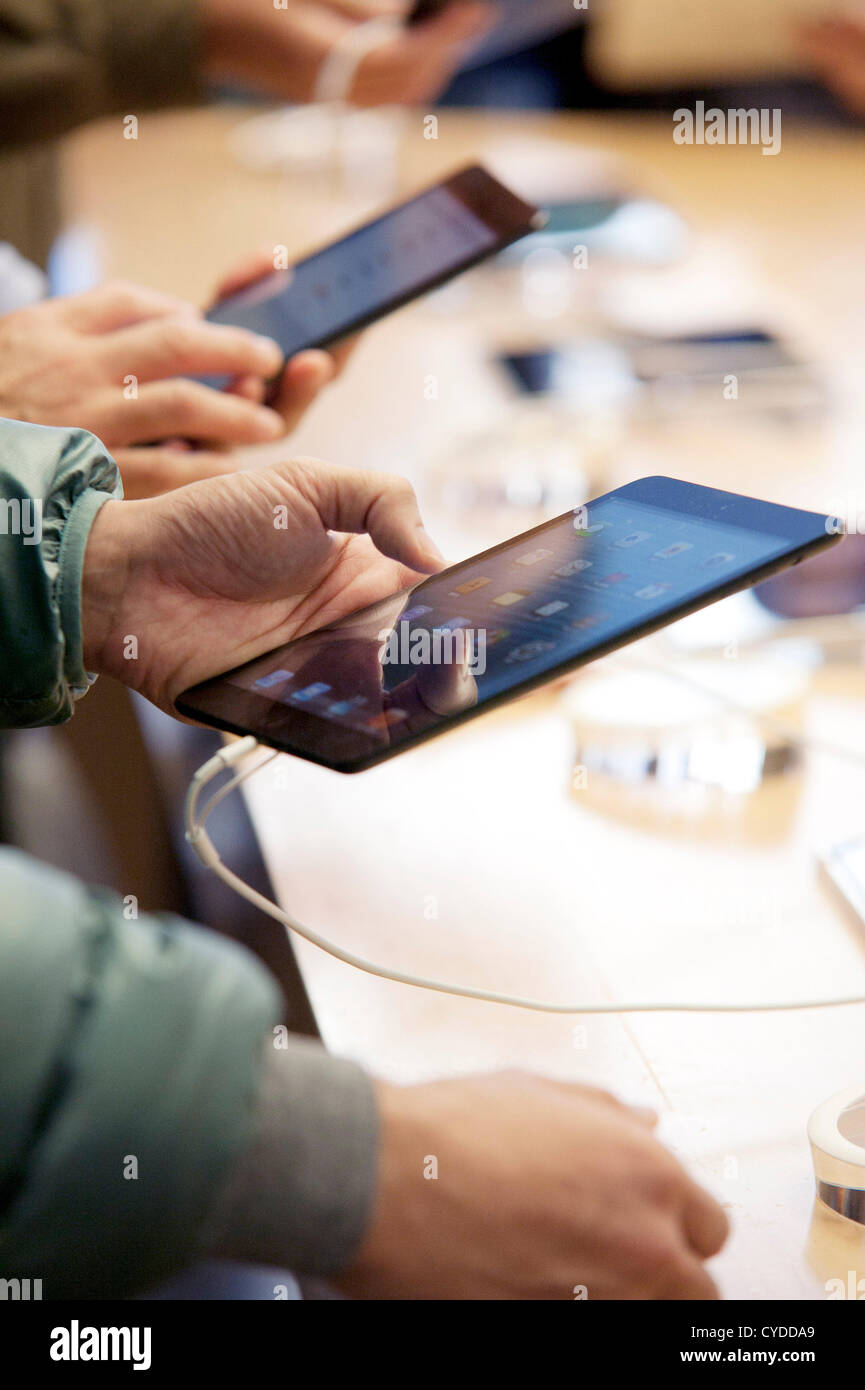 November 2, 2012, Tokyo, Japan - A customers test the new iPad mini ...