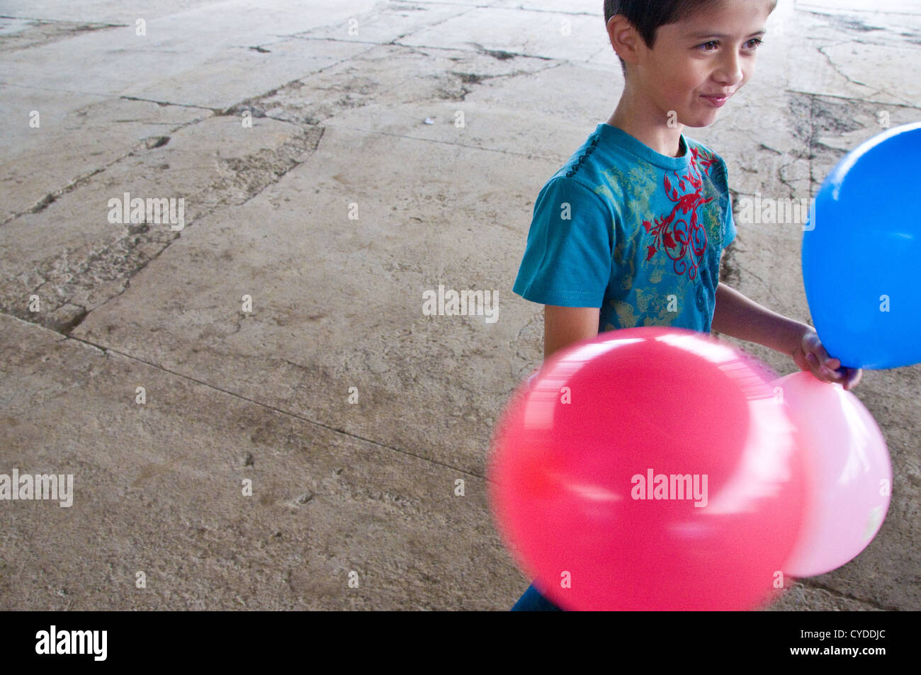 Child with balloons Stock Photo - Alamy