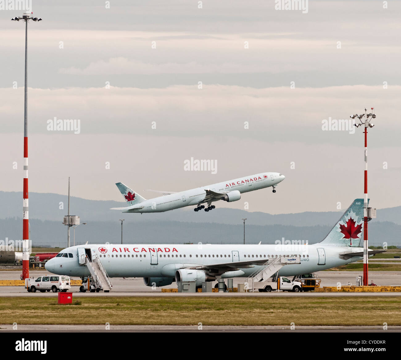 Air Canada jetliners at Vancouver International Airport. Boeing 777 ...