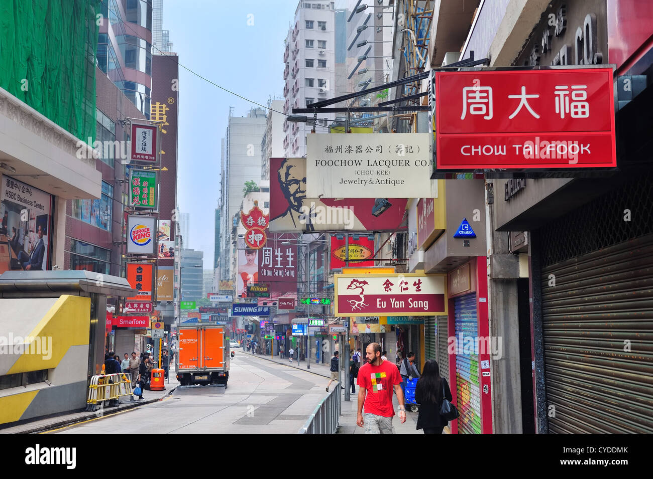 Street view with traffic and shops Stock Photo - Alamy