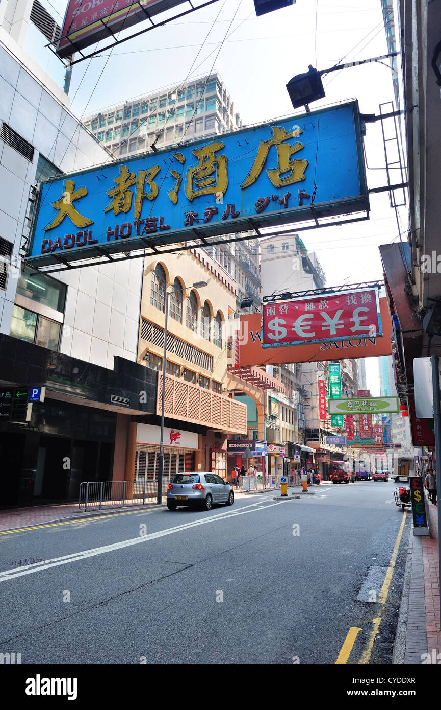Street view with traffic and shops Stock Photo - Alamy