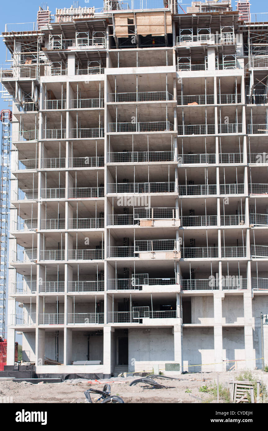 A multi-story condo building under construction Stock Photo - Alamy