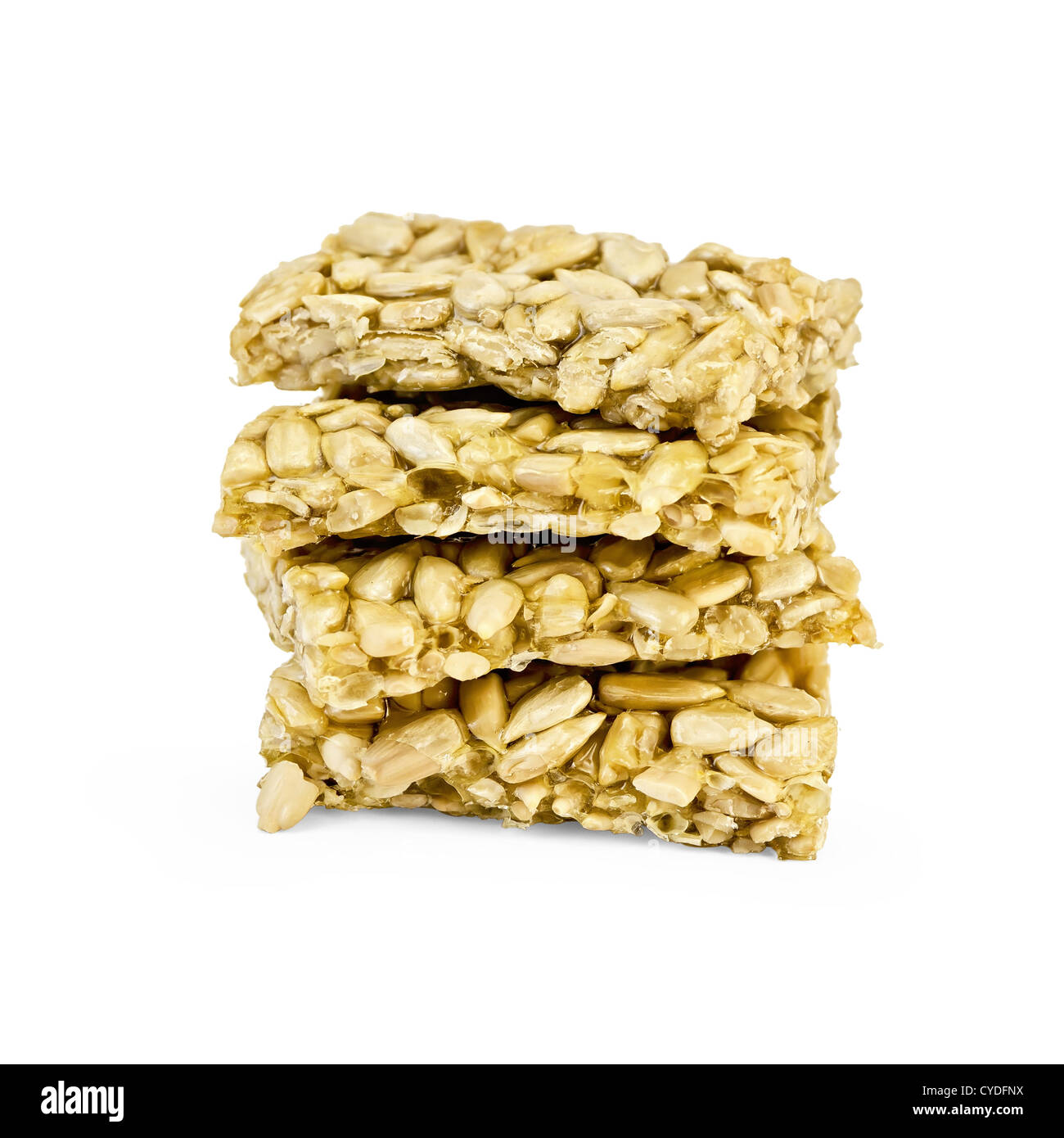 A stack of four cubes sunflower kozinaki isolated on white background ...