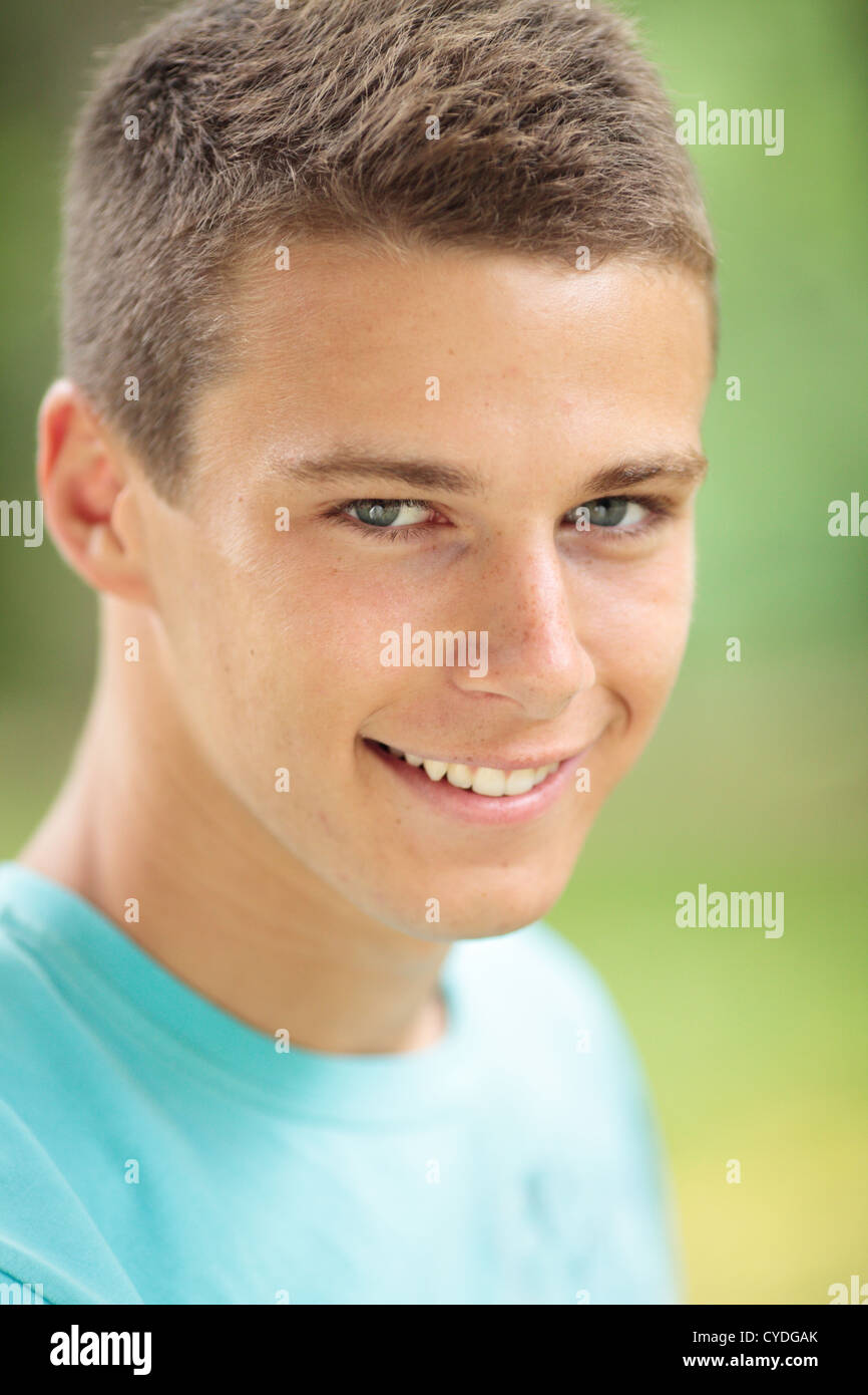 Teen male smiling Stock Photo - Alamy