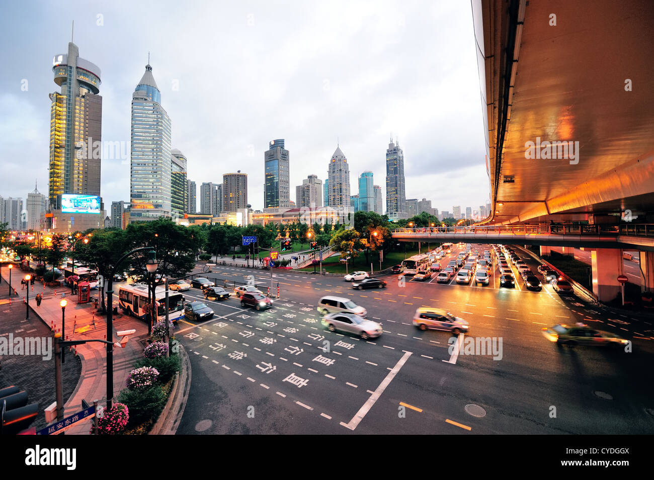 Shanghai street view with urban scene and busy traffic at dusk Stock ...