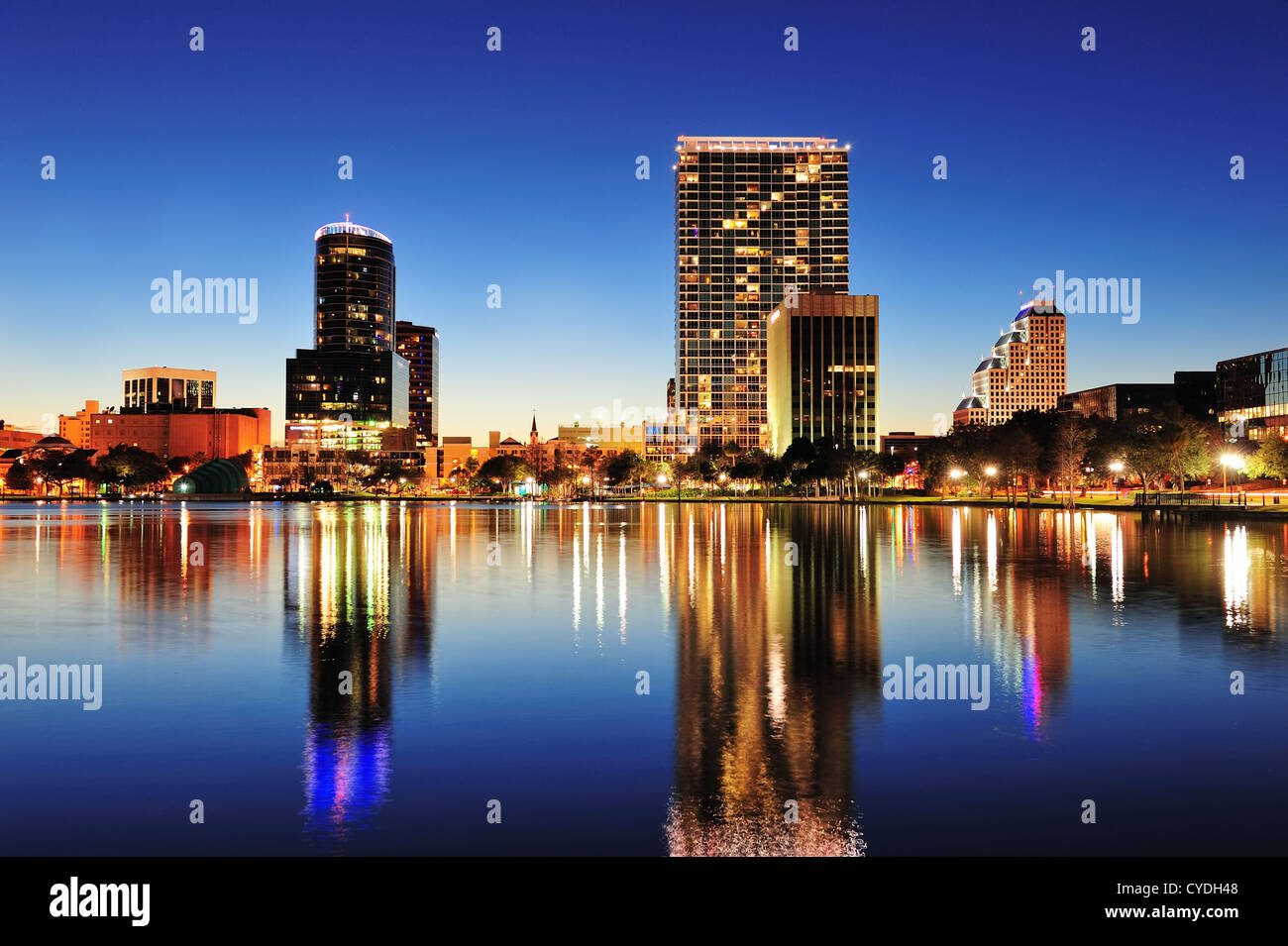 Orlando downtown skyline panorama over Lake Eola at night with urban ...