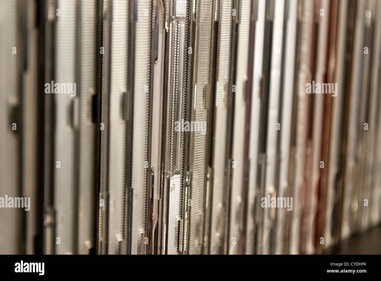 Edges of a row of old CD cases Stock Photo - Alamy