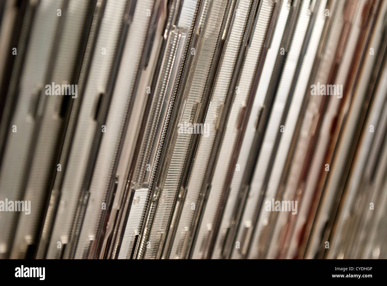 Edges of a row of old CD cases Stock Photo - Alamy