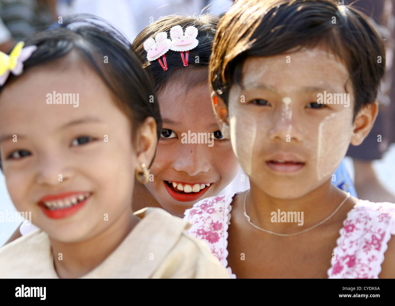 Girls With Thanaka On Cheeks, Rangoon, Myanmar Stock Photo - Alamy