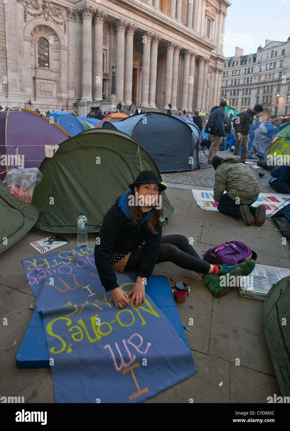 Protester painting Banner at Peaceful Protest St Paul's Stock Photo - Alamy