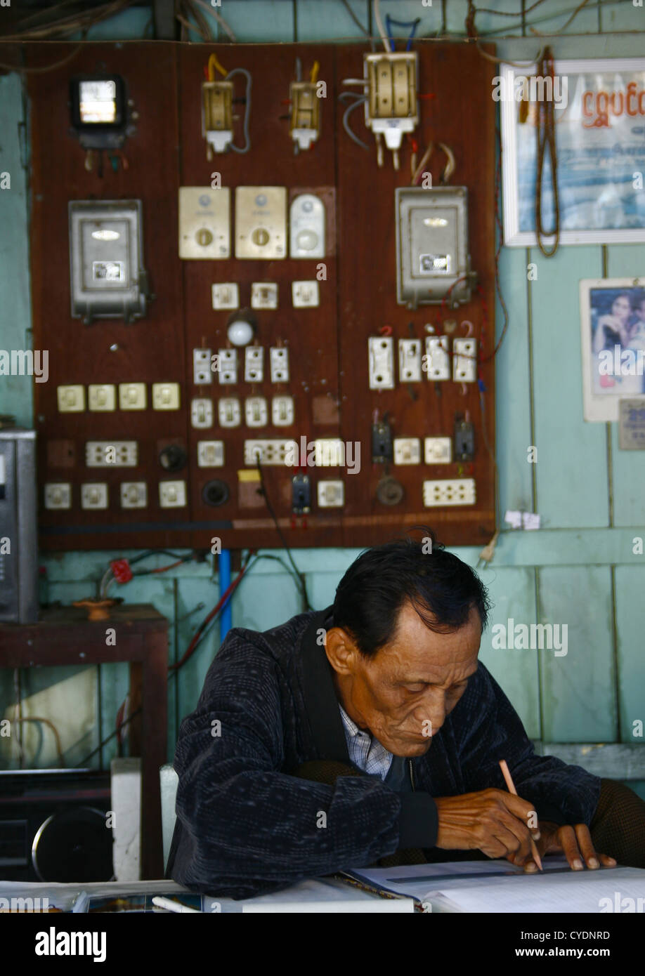 Man Working In An Office, Bagan, Myanmar Stock Photo - Alamy