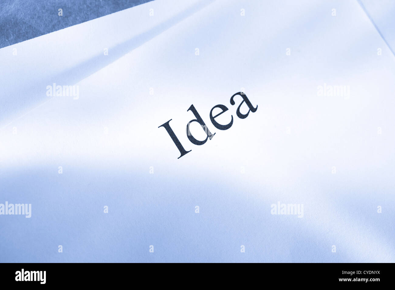 Idea conception on blank paper Stock Photo - Alamy