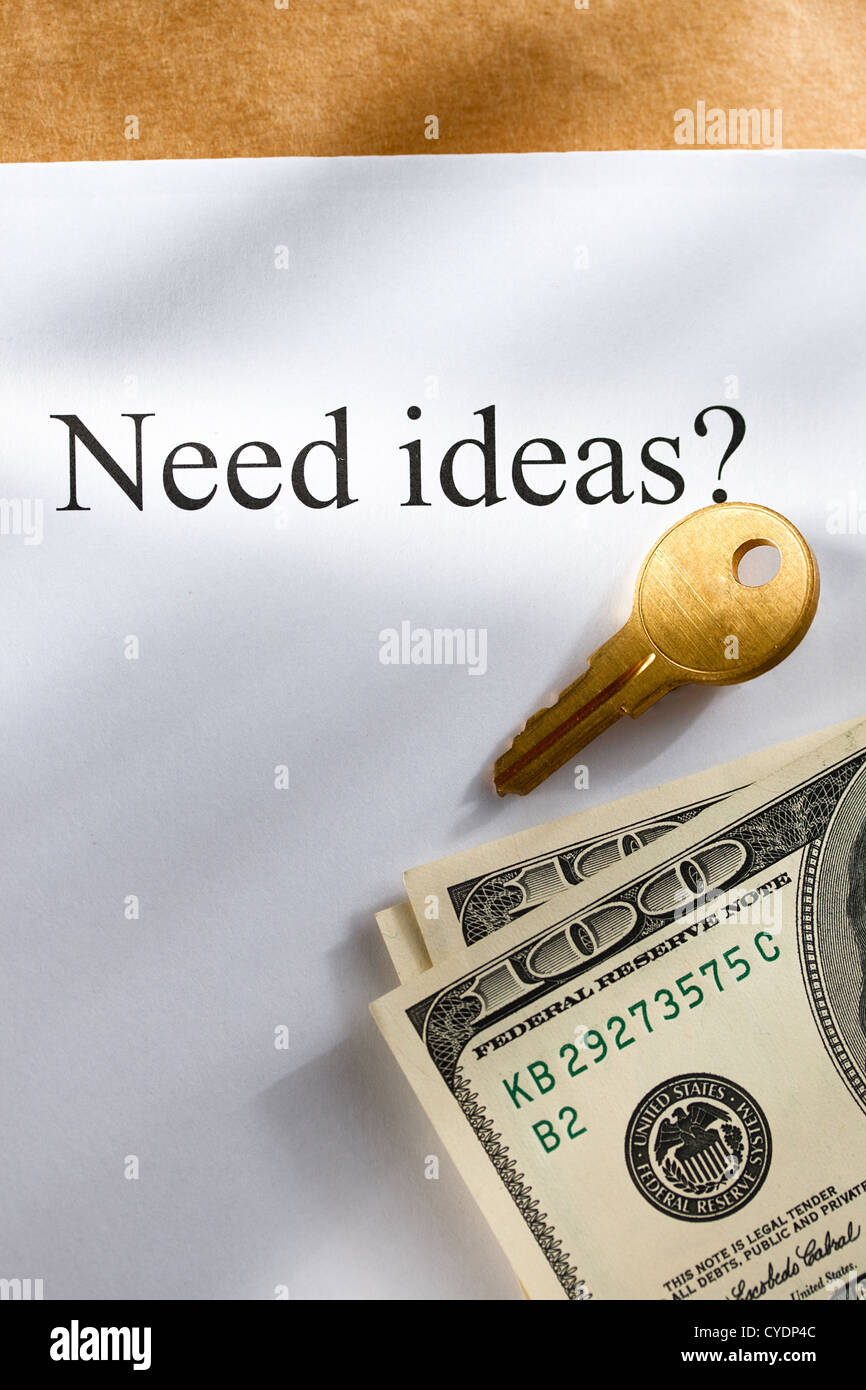 Idea conception with key and money Stock Photo - Alamy