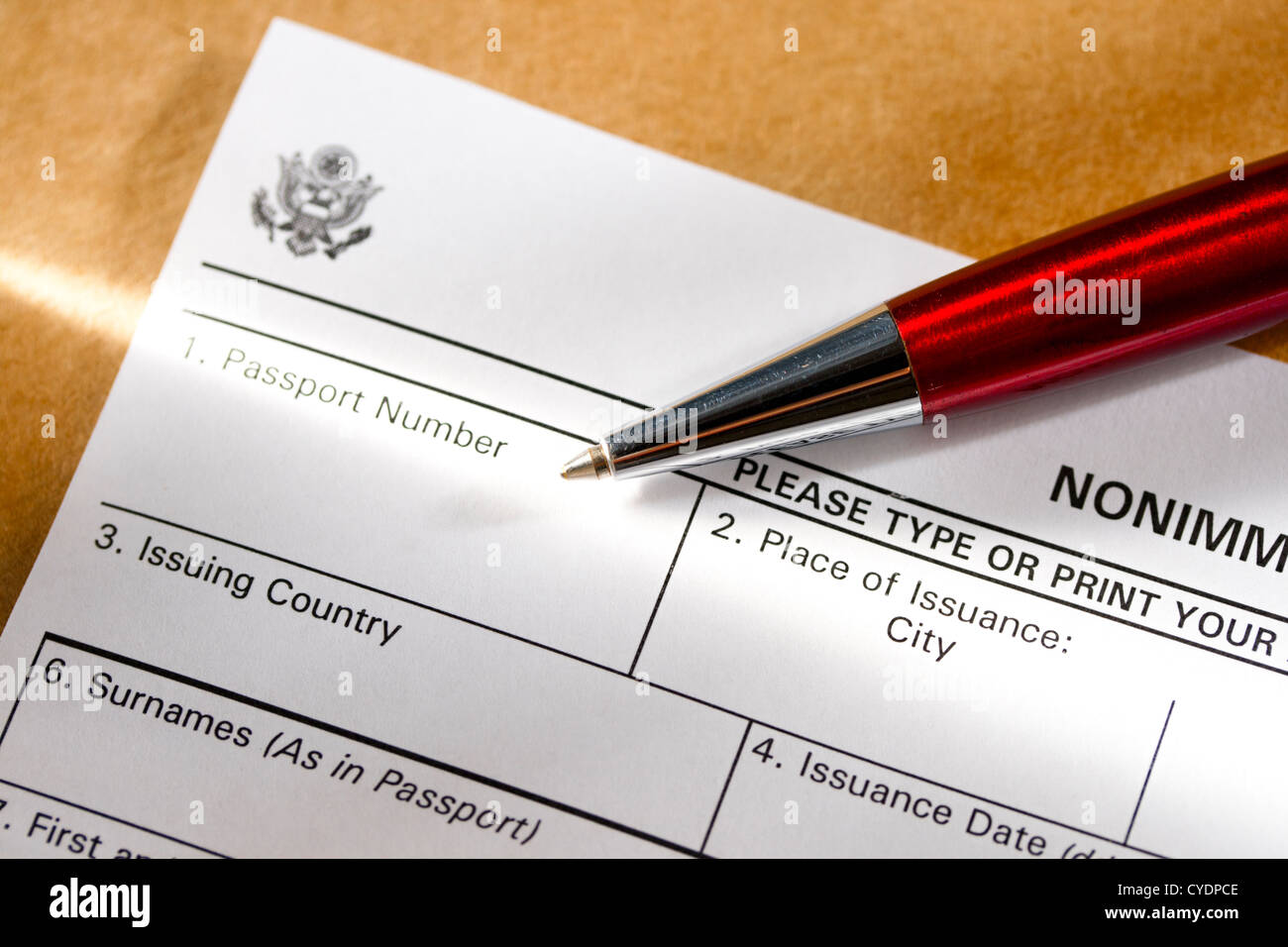Application form with pen Stock Photo - Alamy