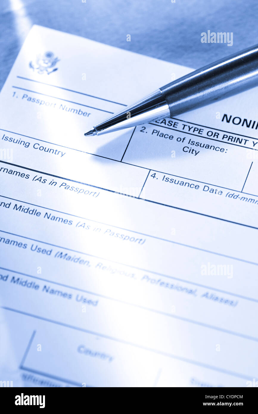 Application form with pen Stock Photo - Alamy