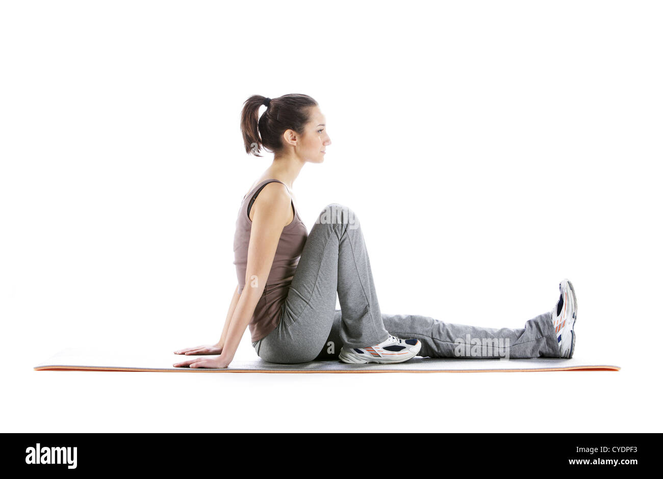 Fitness woman doing fitness exercise on mat . White background Stock ...