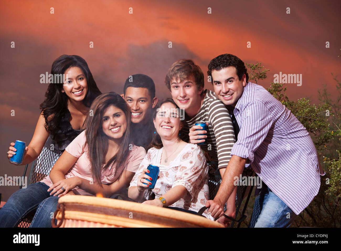 Group of six happy friends with drinks at a cookout Stock Photo - Alamy