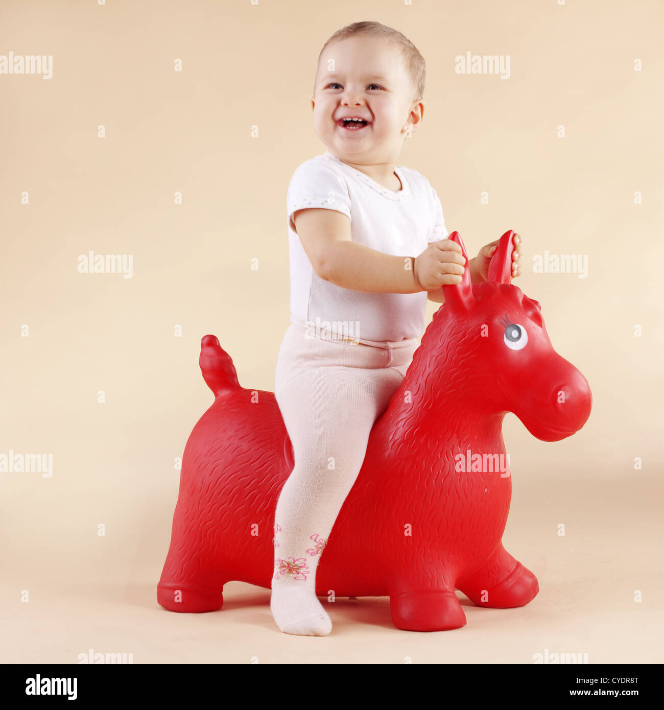Baby straddle hi-res stock photography and images - Alamy