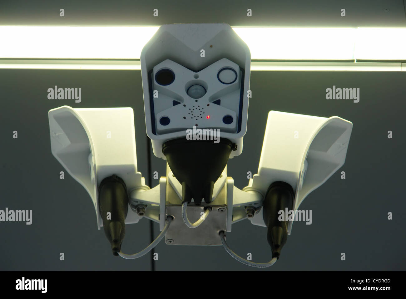 surveillance security camera on wall Stock Photo - Alamy