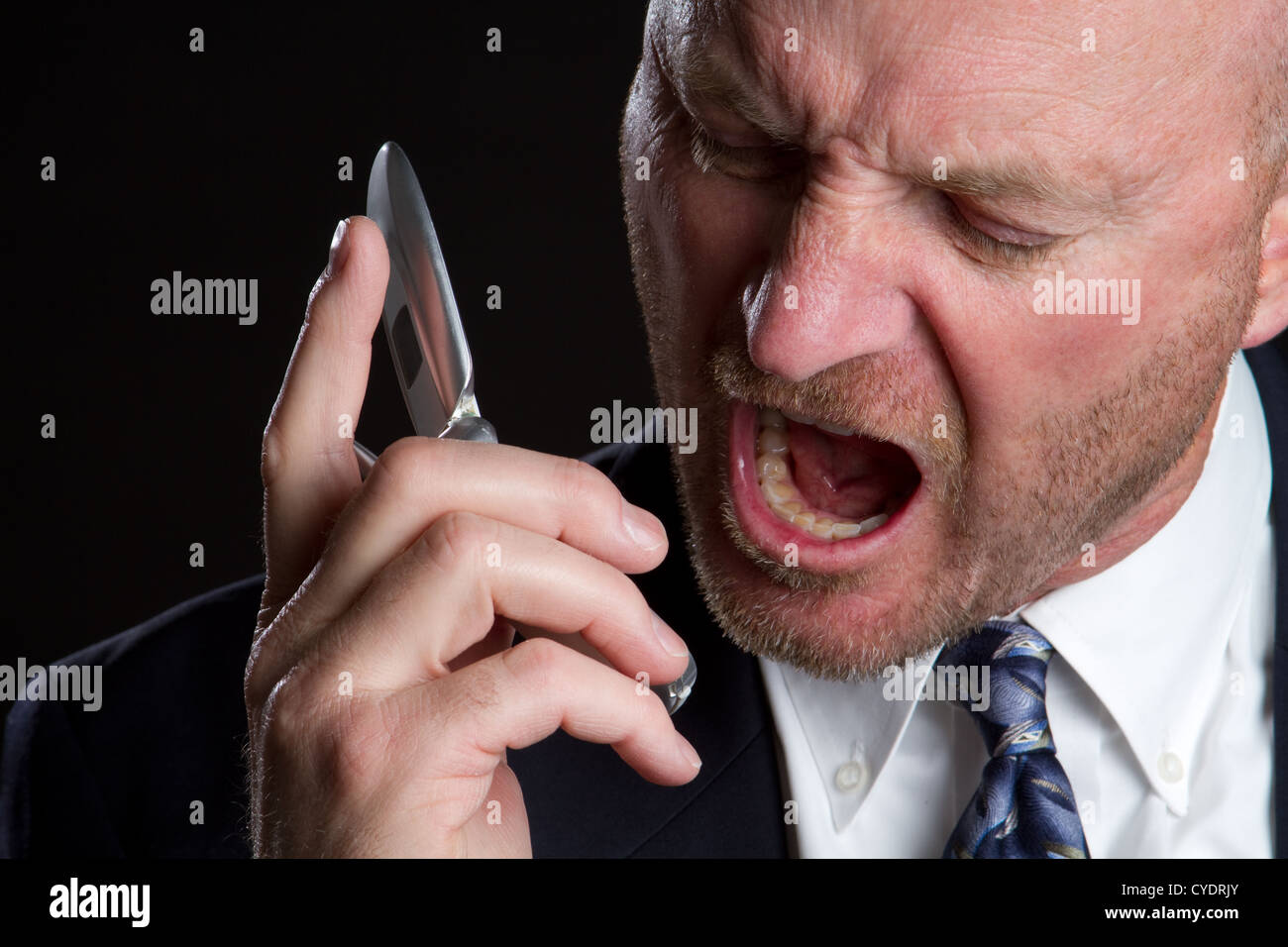 Screaming Phone Man Stock Photo - Alamy