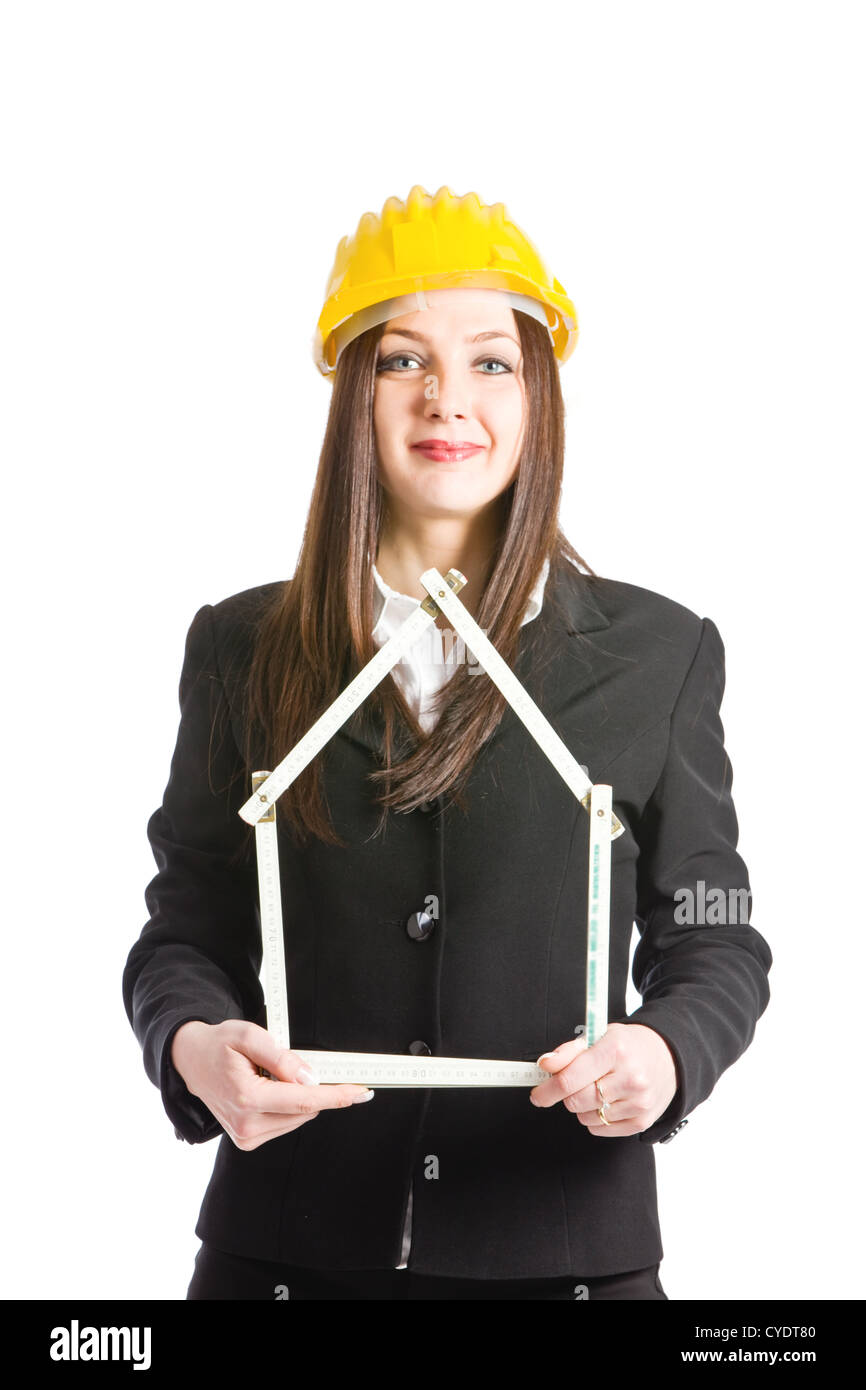 photo of young female architect with helmet and plans Stock Photo - Alamy