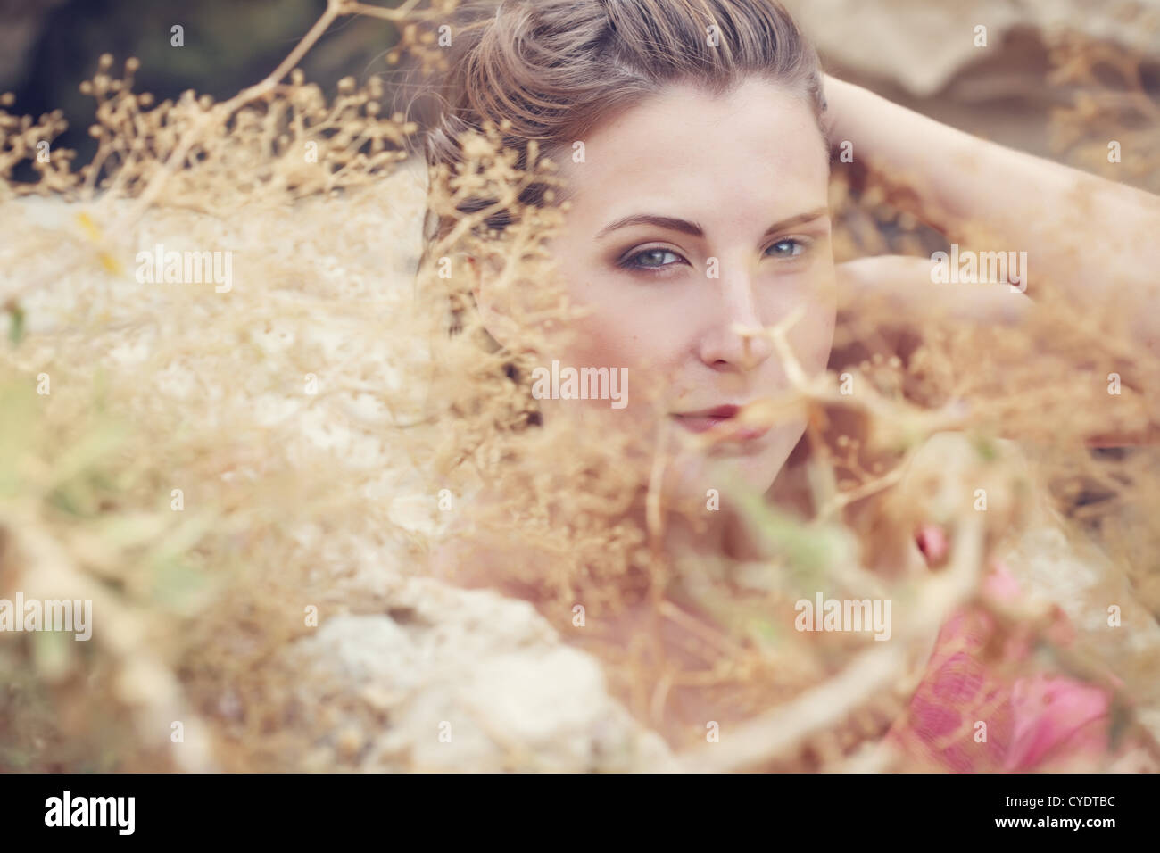 Beautiful young woman posing outdoors Stock Photo - Alamy