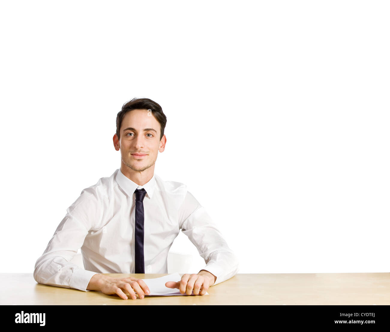 conceptual photo of manager sitting at his desk on white background ...