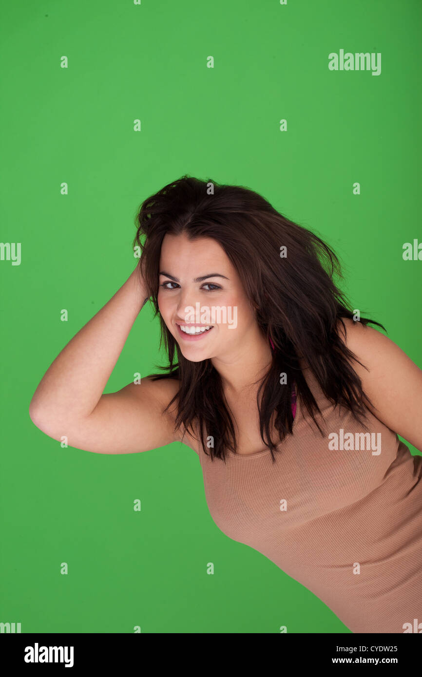 Smiling Beauty With Long Mussed Hair and cheeky smile leaning in from ...