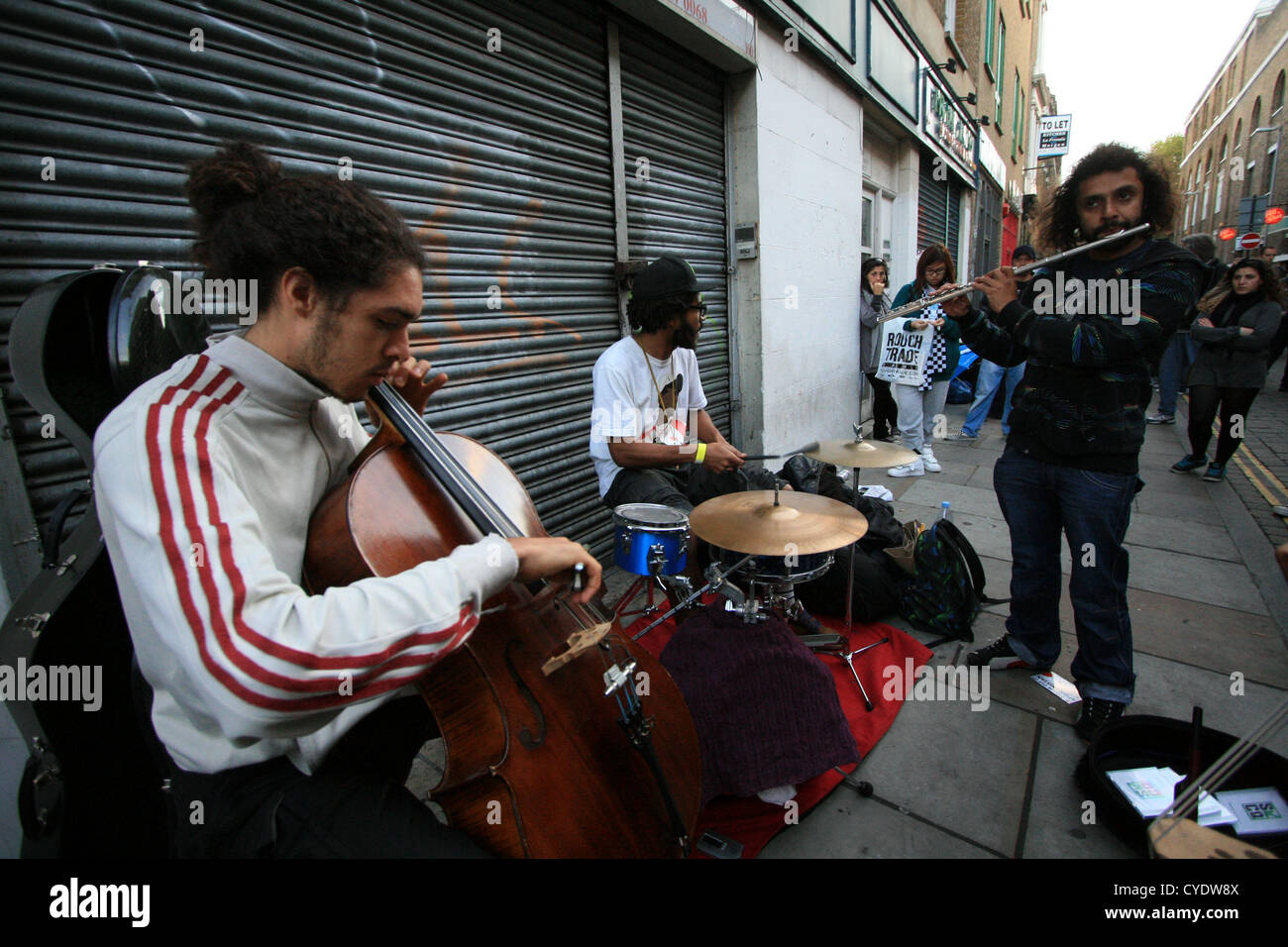 Street Buskers, Brick Lane, London Stock Photo - Alamy
