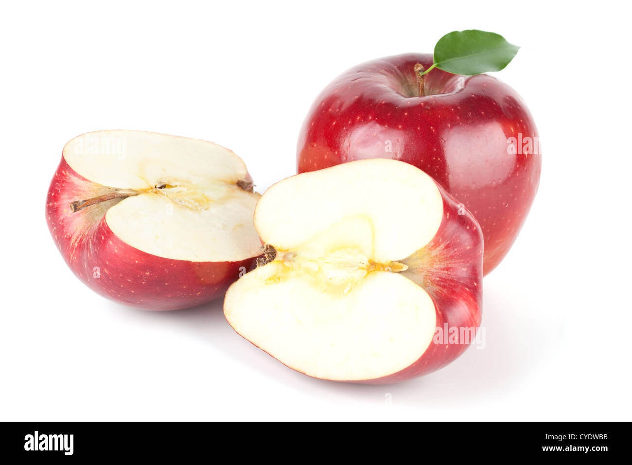 A Ripe Red Apple With Leaf and two halves isolated on white background ...