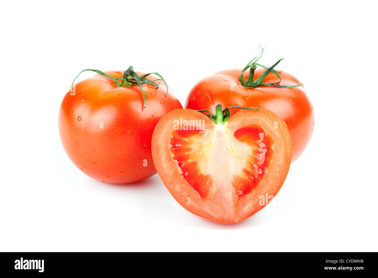 Three tomatoes isolated on white background Stock Photo - Alamy