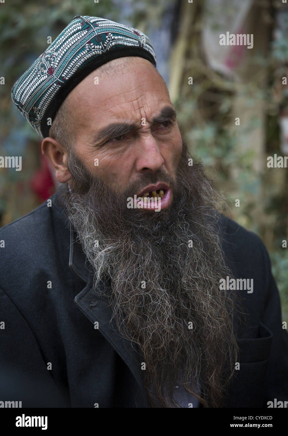 Uyghur Sufi Men Praying At Imam Asim Tomb In The Taklamakan Desert ...