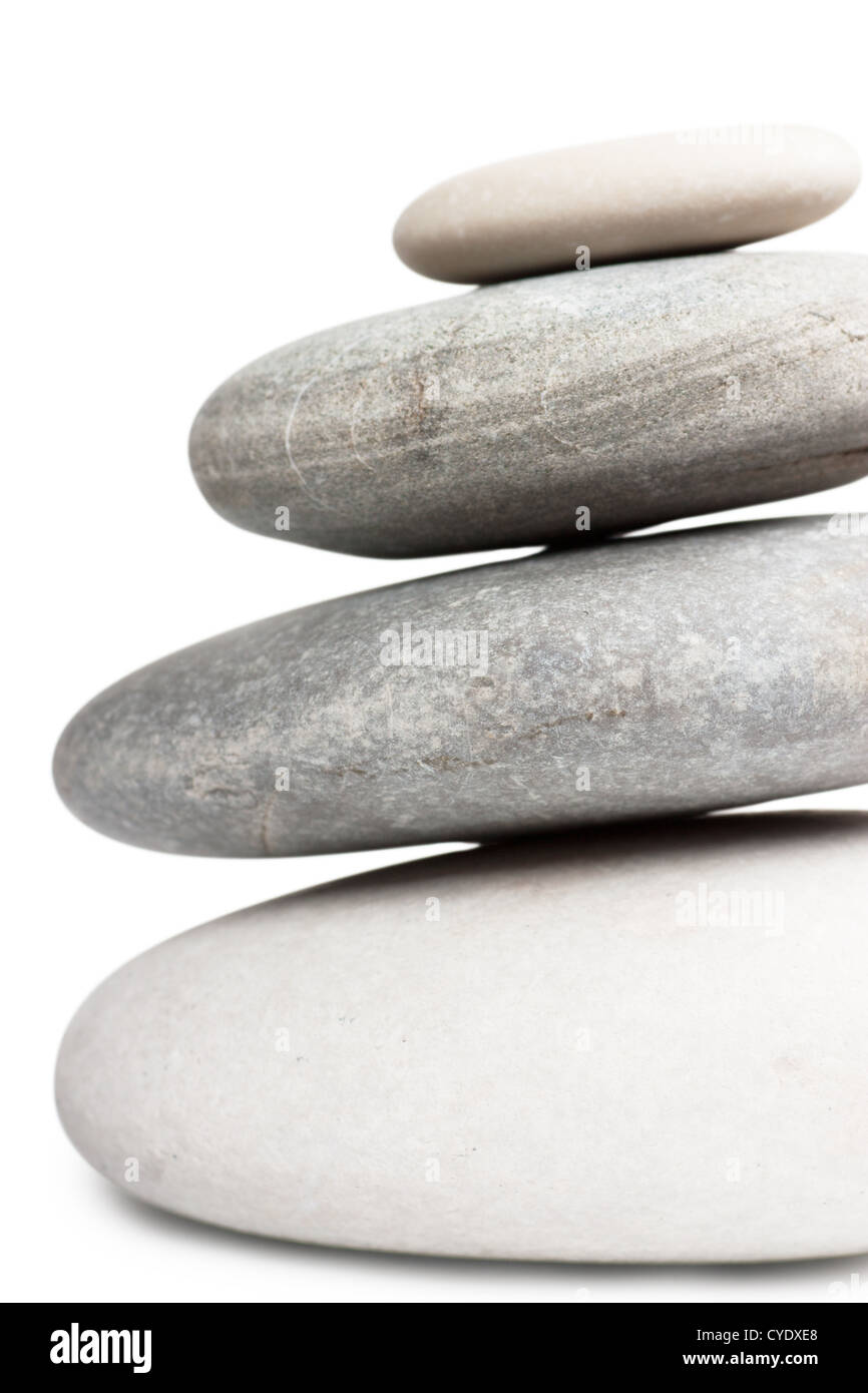 Stack of four round stones isolated over white background Stock Photo ...