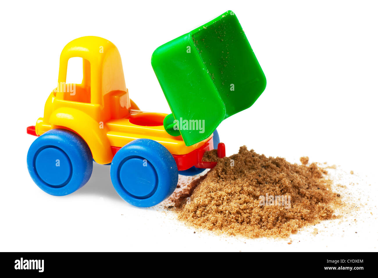 Colorful toy truck with sand over white background Stock Photo - Alamy