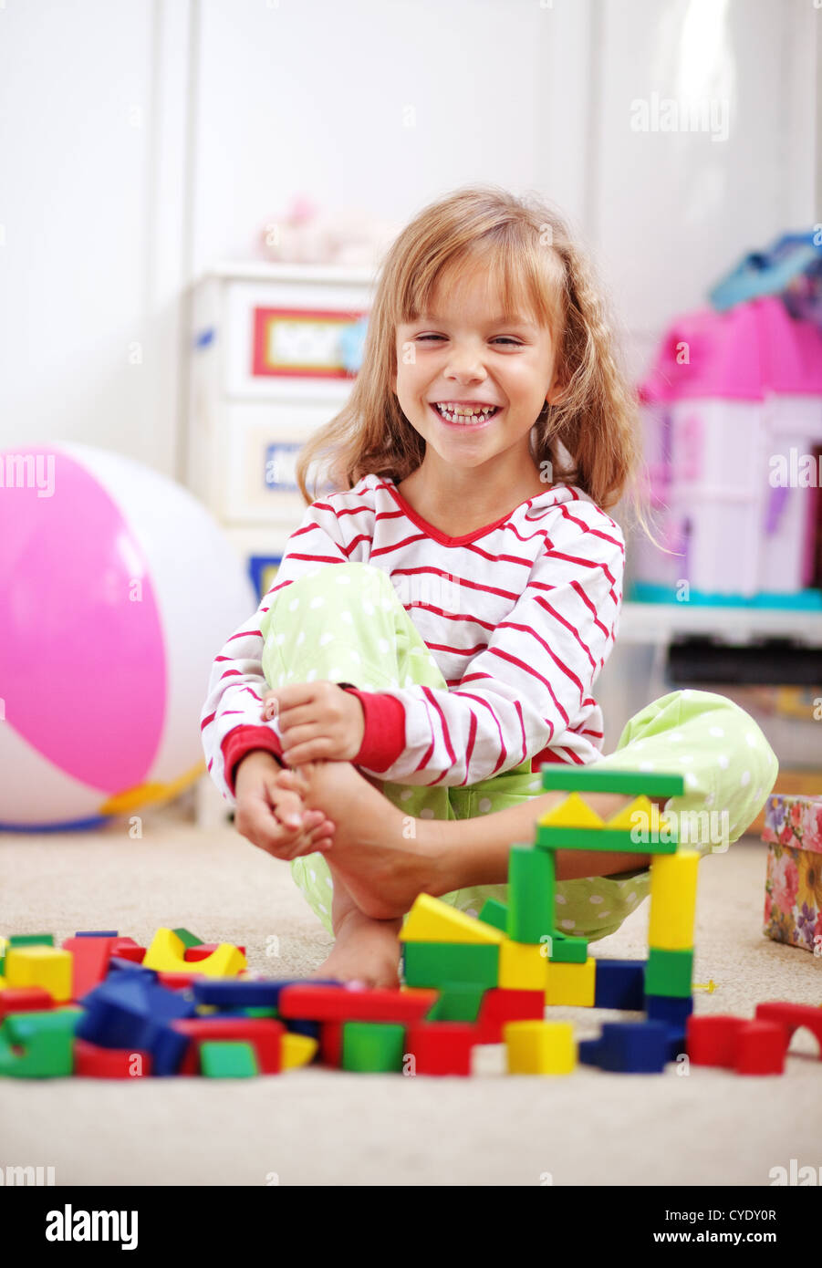 Child playing with bricks Stock Photo - Alamy