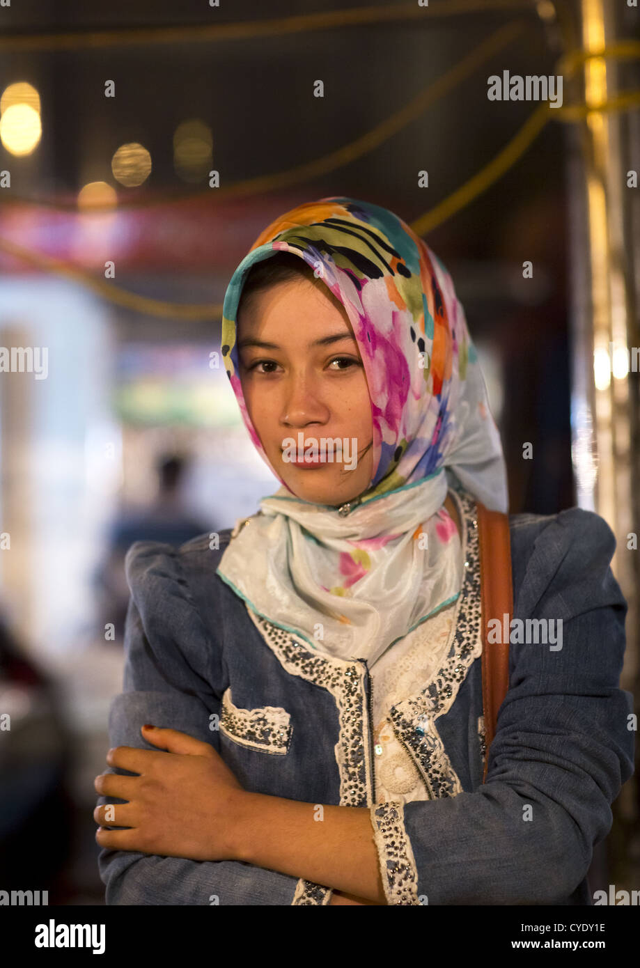 Young Uyghur Woman In Night Market, Hotan, Xinjiang Uyghur Autonomous ...