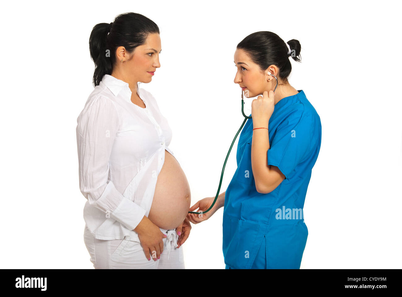 Doctor woman examine pregnant woman tummy isolated on white background ...