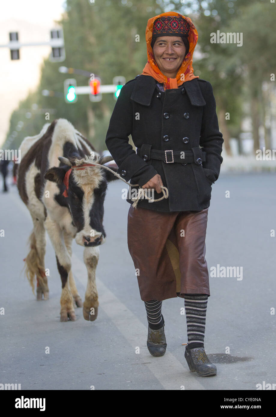 Tajik Woman With Her Cow , Xinjiang Uyghur Autonomous Region, China ...