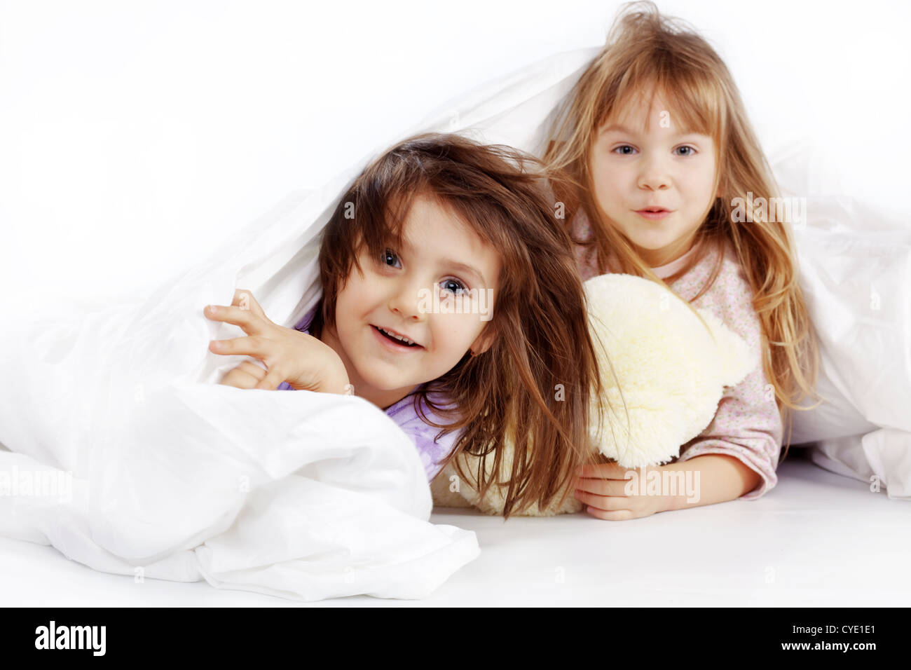 Portrait of children in bed Stock Photo - Alamy